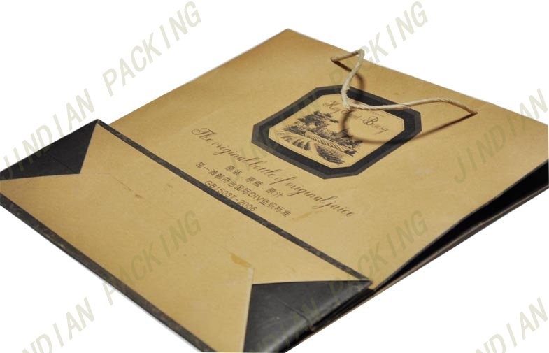 Le borse per la promozione, vestiti del regalo della carta kraft Hanno riciclato i sacchetti della spesa di carta