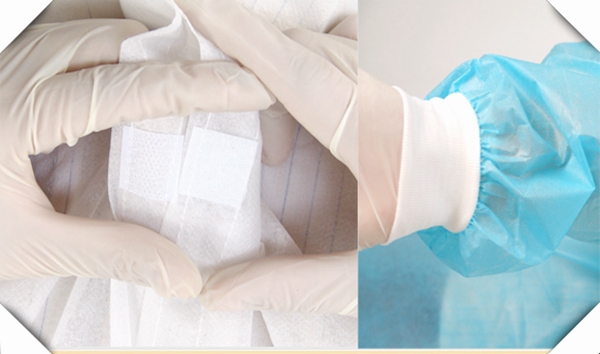 O trabalho médico do produto veste vestidos cirúrgicos descartáveis verdes de vestido cirúrgico do isolamento plástico estéril do vestido cirúrgico