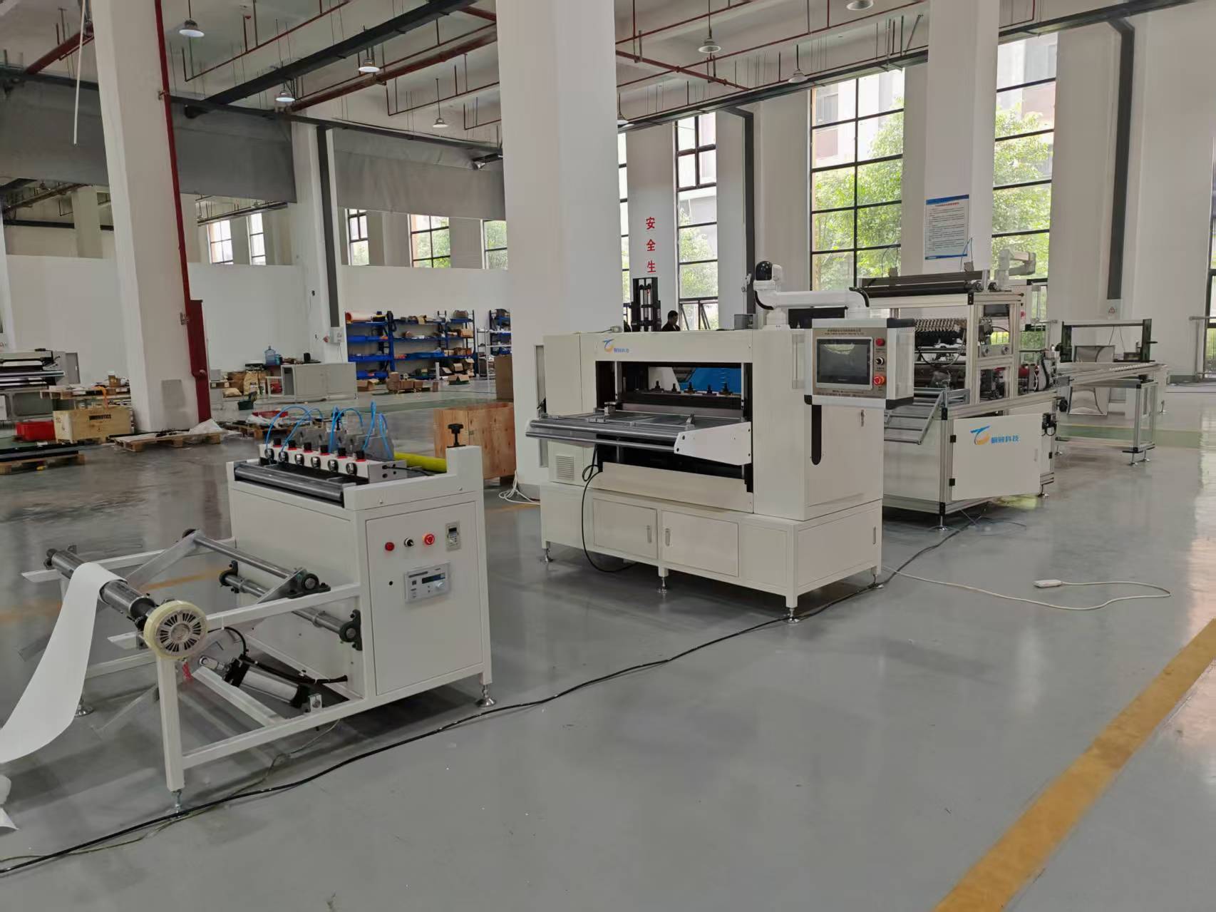 Close-up of paper pleating mechanism