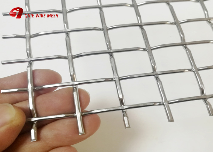 grillage serti par replis d'acier inoxydable