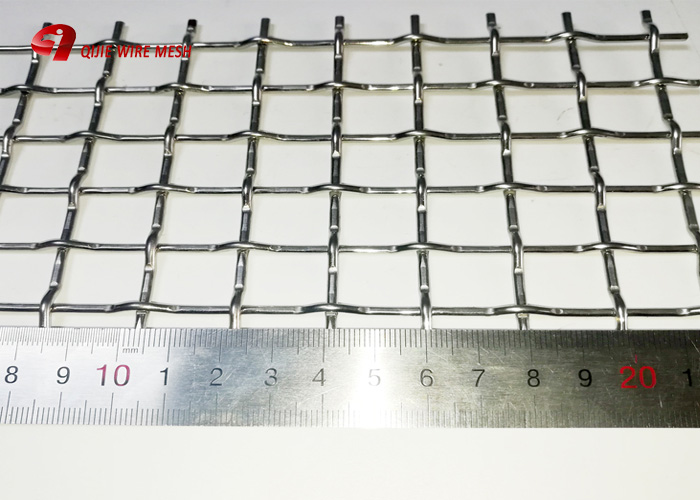 grillage serti par replis d'acier inoxydable
