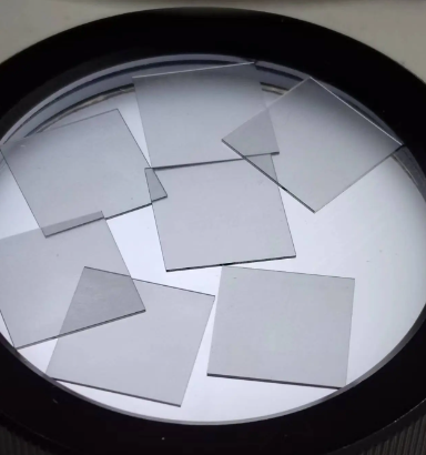 CVD diamond wafer under magnification revealing perfect edge cuts