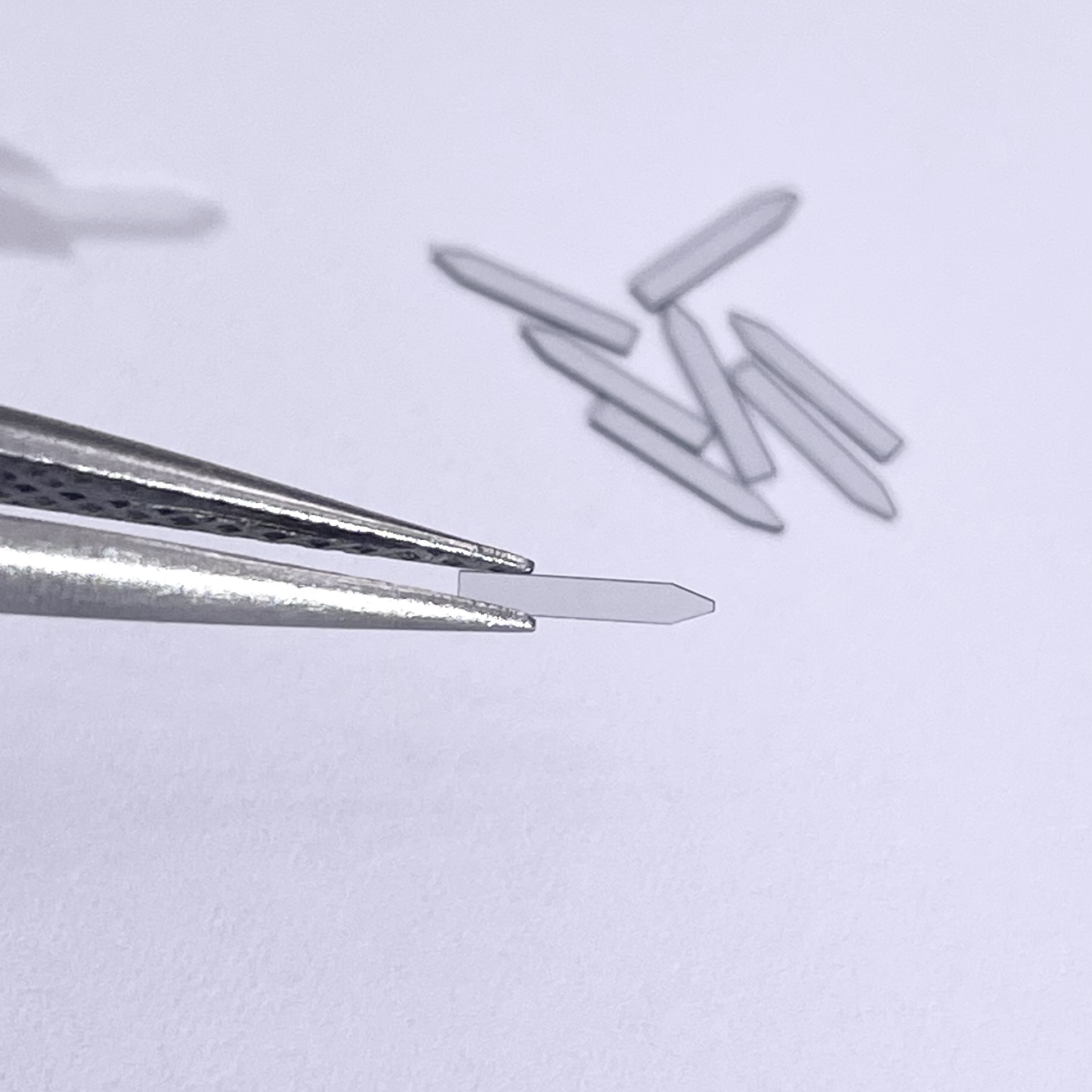 Precision CVD diamond surgical blades in packaging